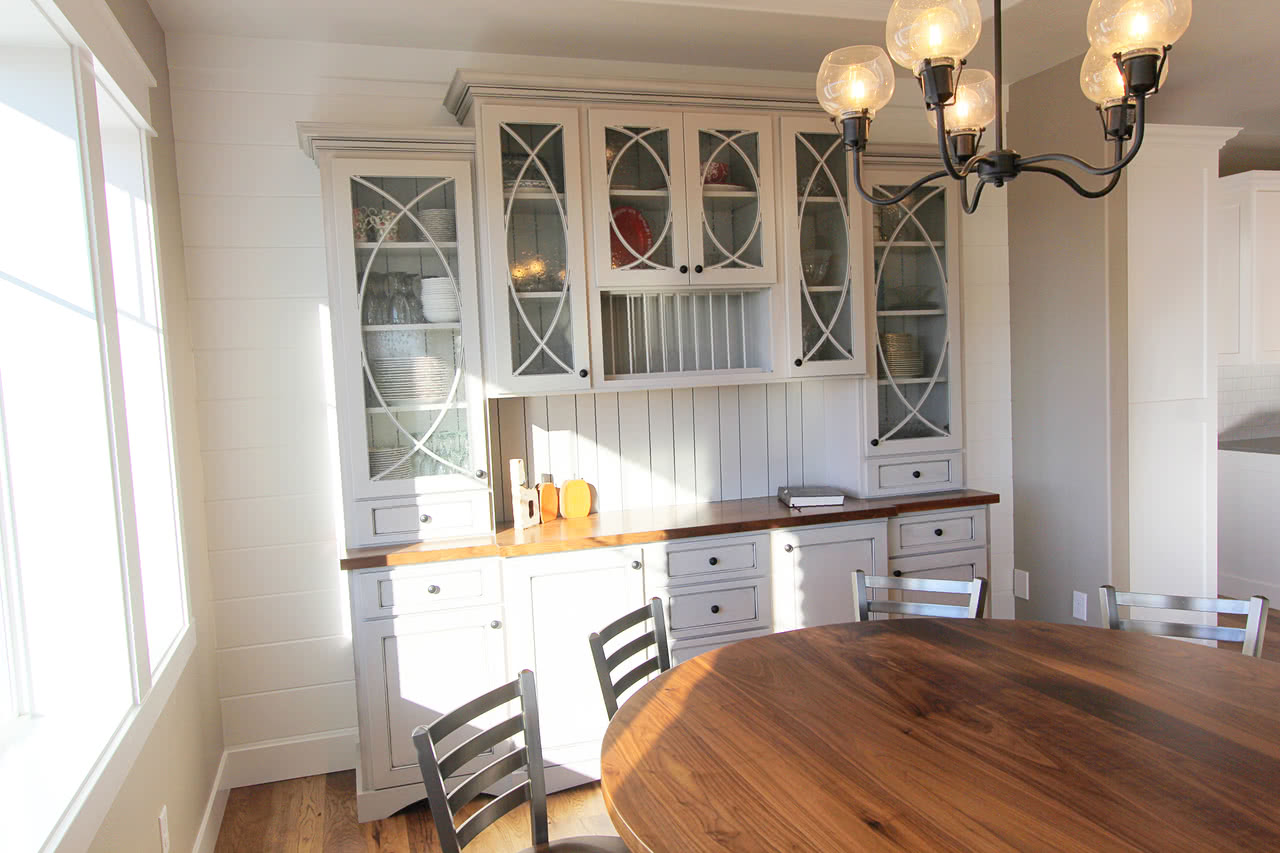 A custom designed hutch adds display and storage space | Premier ...