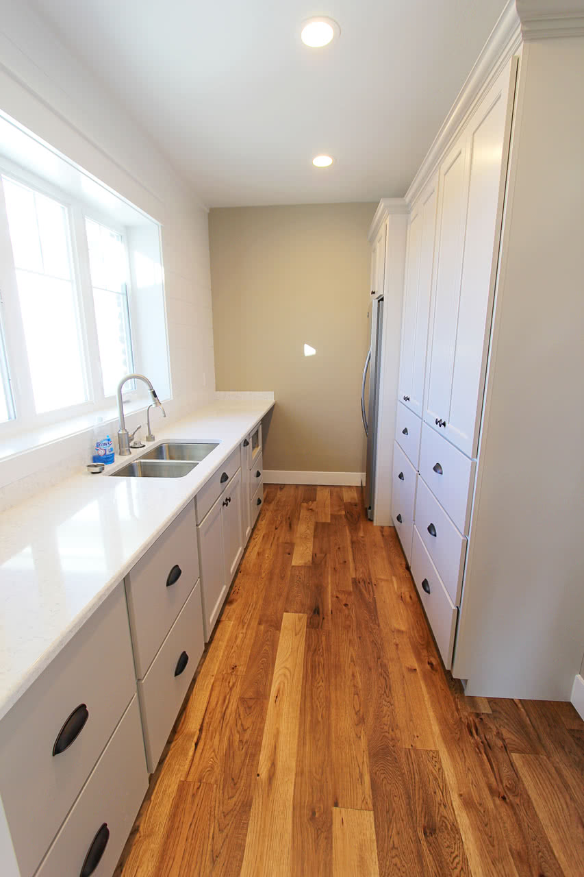 Pantries create loads of storage space for food and appliances ...